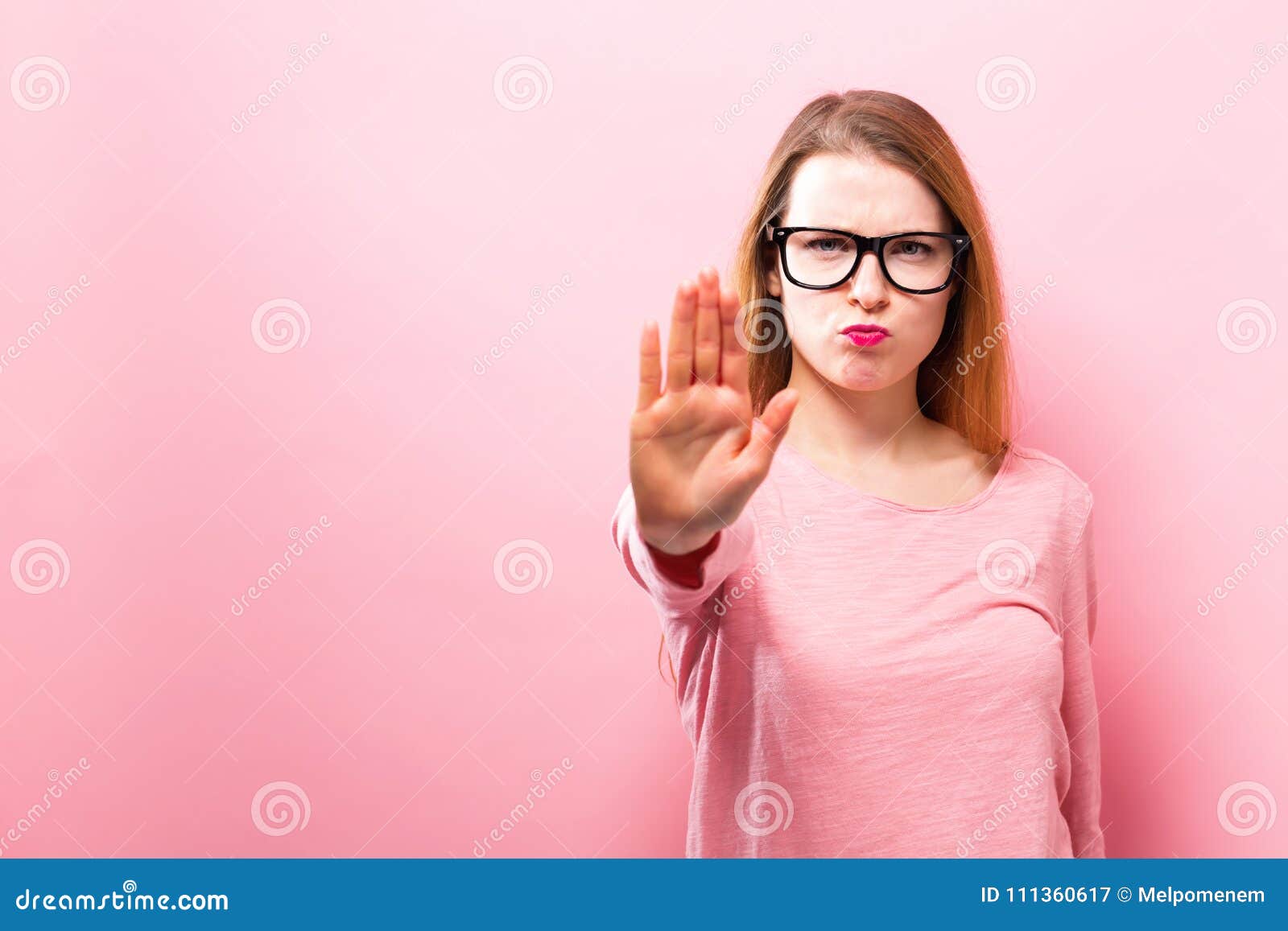 Young Woman Making a Rejection Pose Stock Image - Image of palm, hand ...