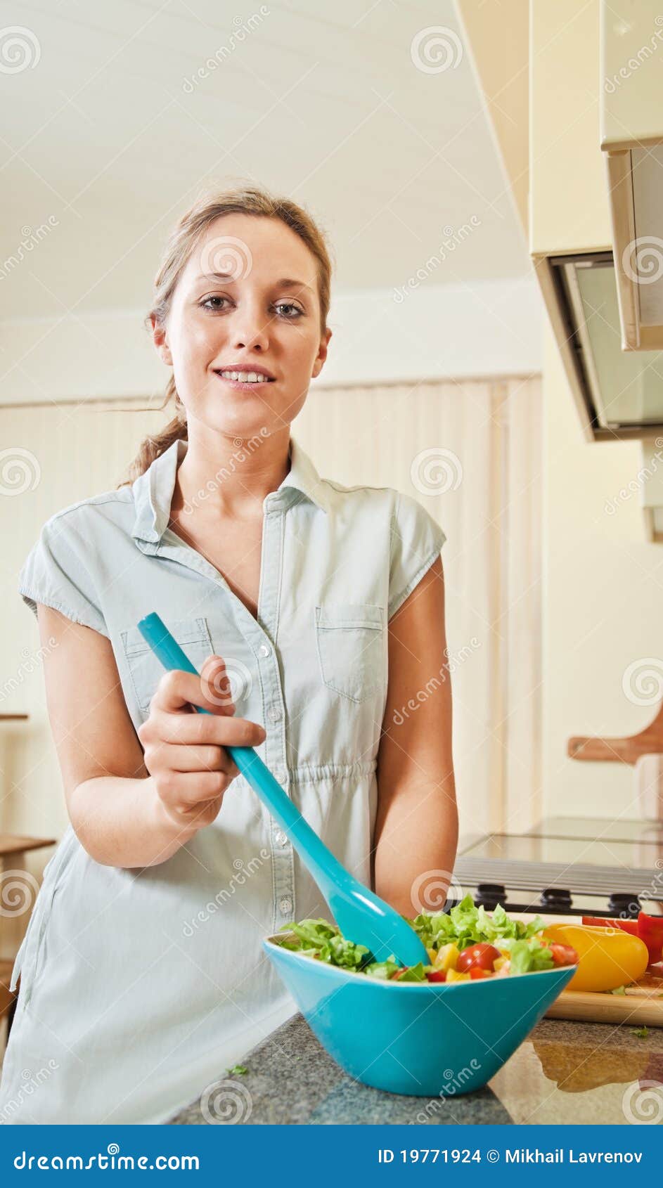 Young woman making salad stock photo. Image of healthy - 19771924