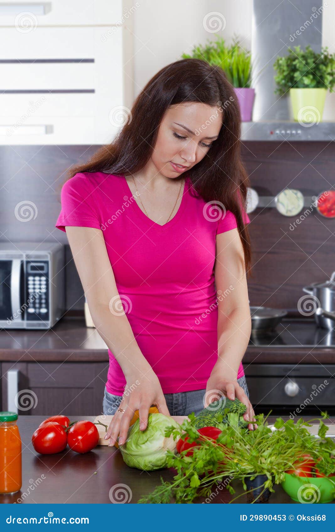 Young woman making salad stock image. Image of activity - 29890453
