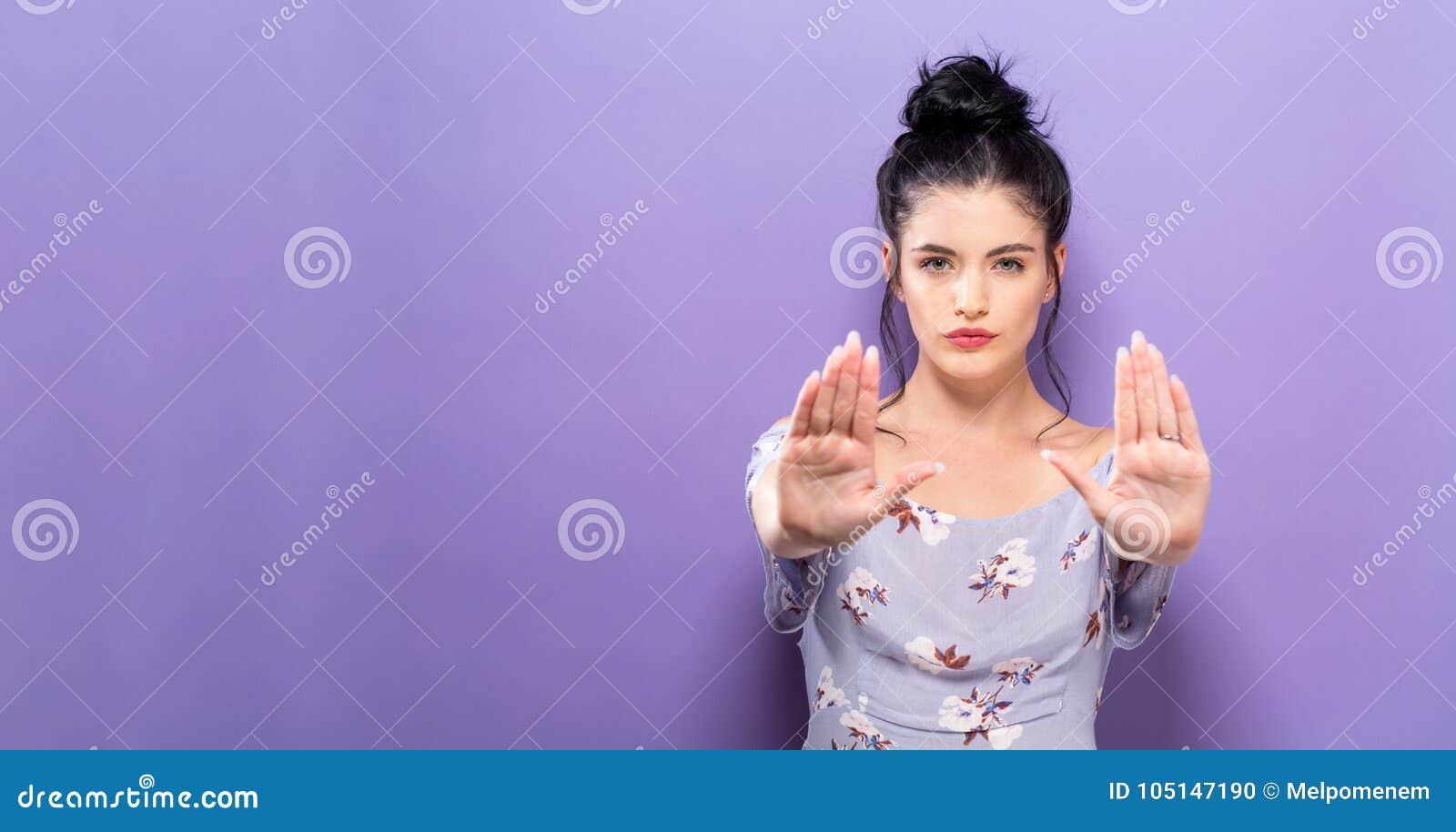 Young Woman Making a Stop Pose Stock Photo - Image of purple, girl ...