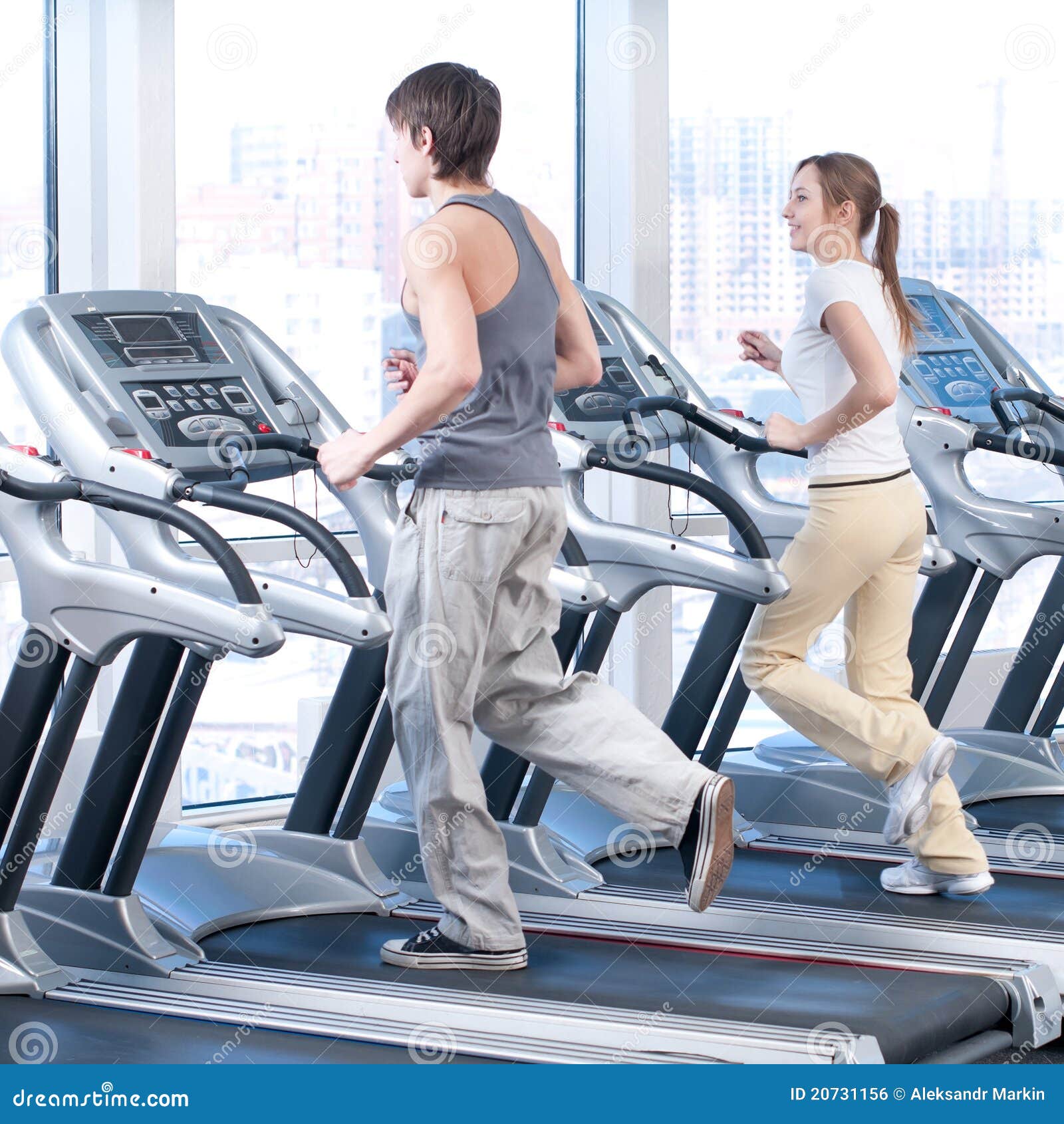 Young Woman and Man at the Gym Exercising. Running Stock Photo - Image ...