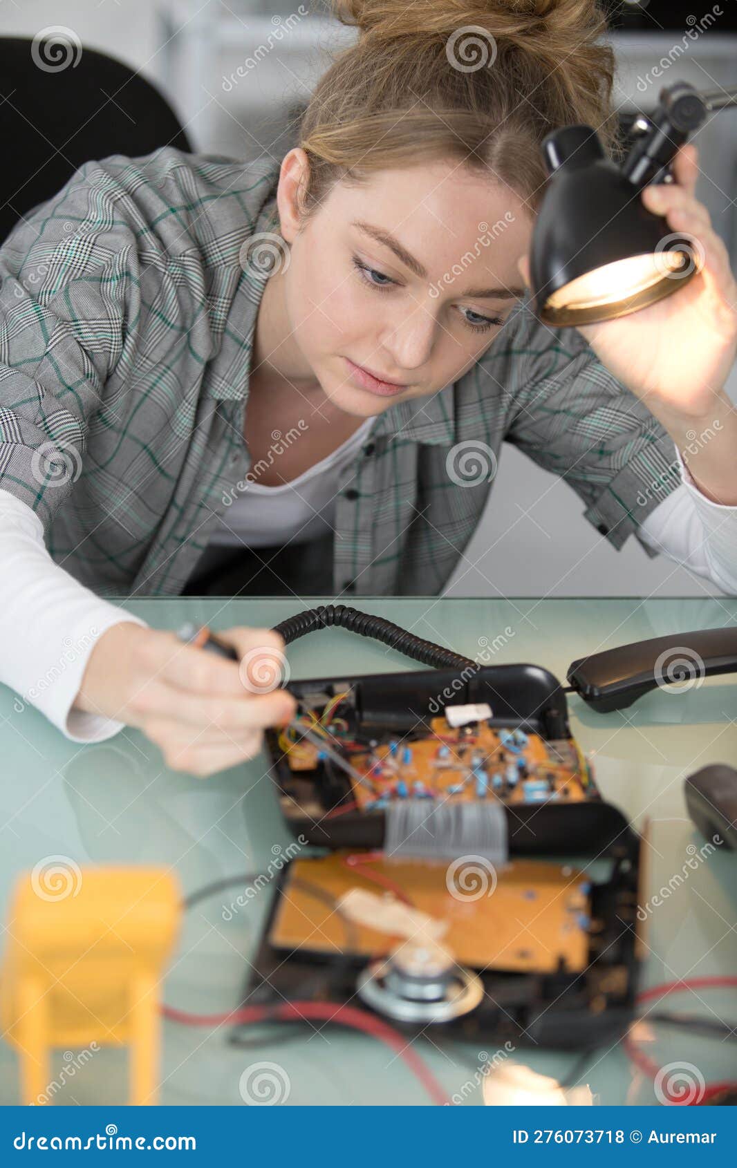 Young Woman with Measuring Devices in Electronics Engineer Laboratory ...