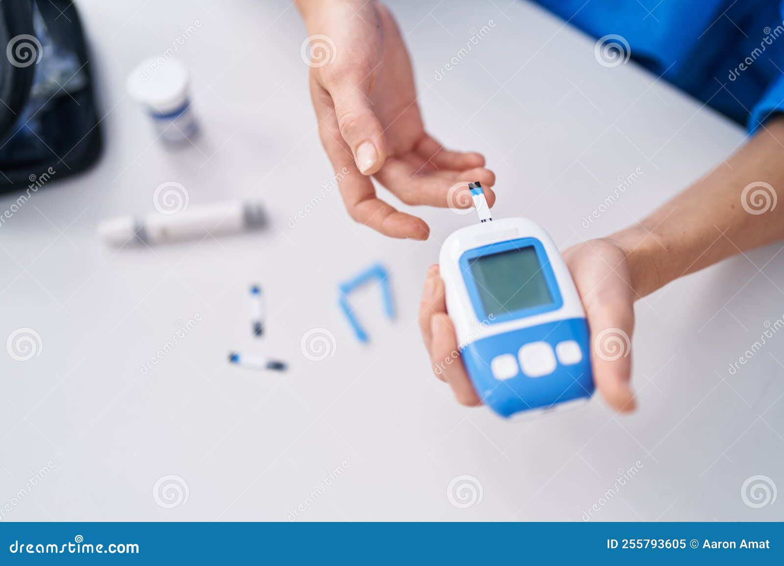 Young Woman Measuring Glucose Using Glucometer at Home Stock Image ...
