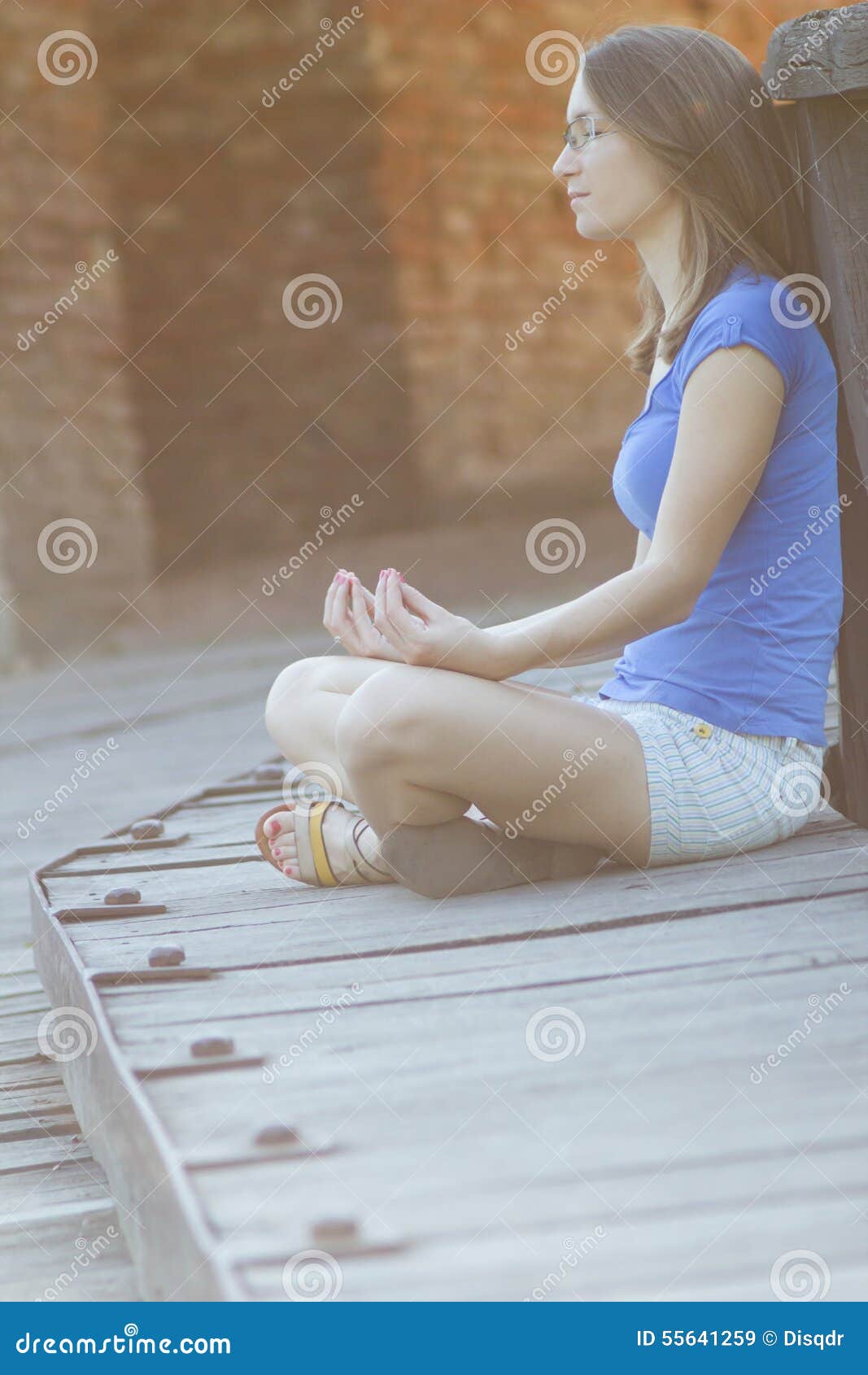 Young Woman Meditating Alone Stock Image - Image of relaxed, praising ...