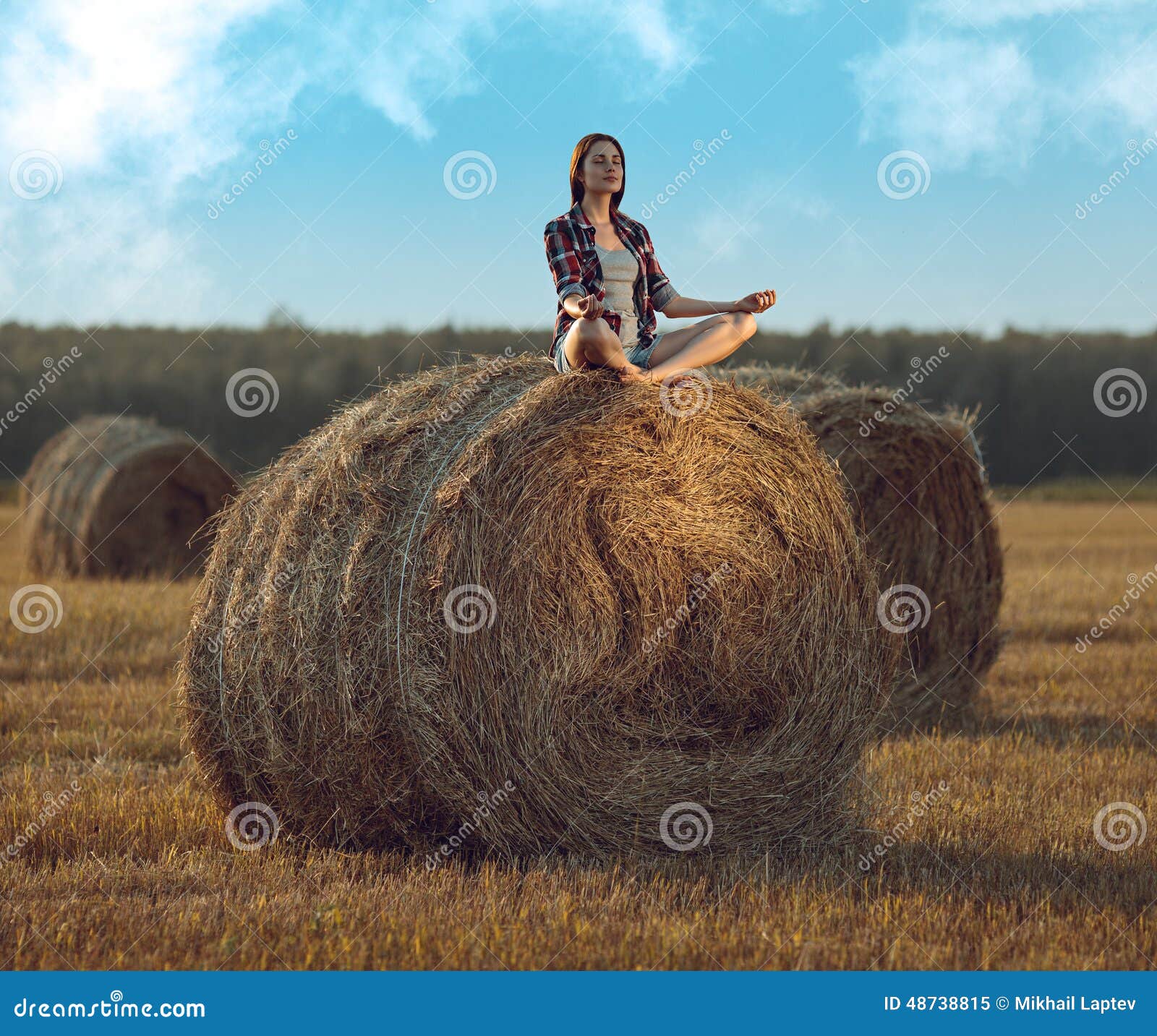 Young Woman Meditating on Haystack Stock Image - Image of female, girl ...