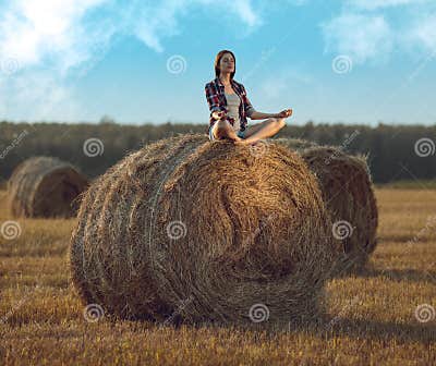 Young Woman Meditating on Haystack Stock Image - Image of female, girl ...