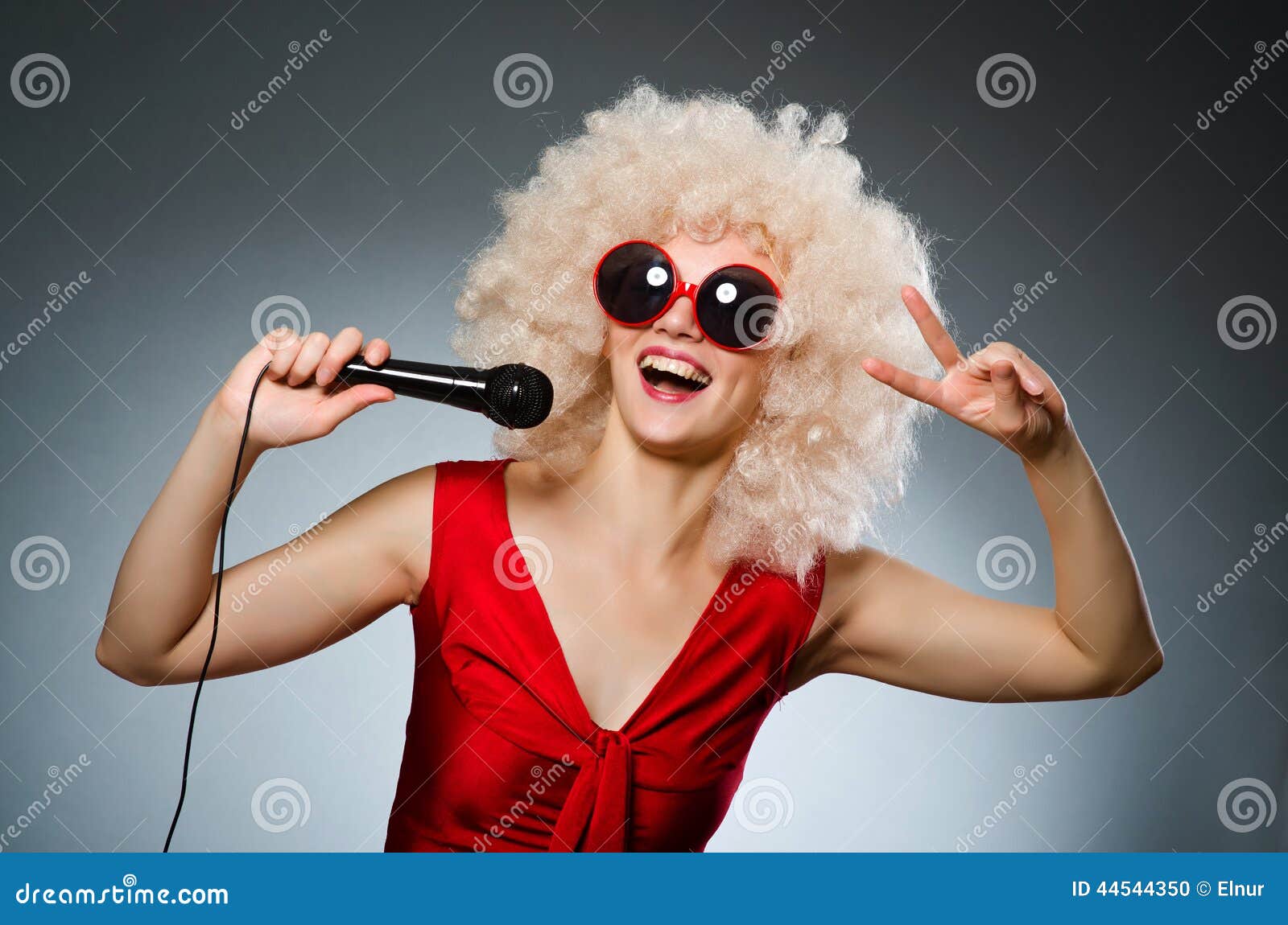 Young woman with mic stock photo. Image of party, hairstyle - 44544350