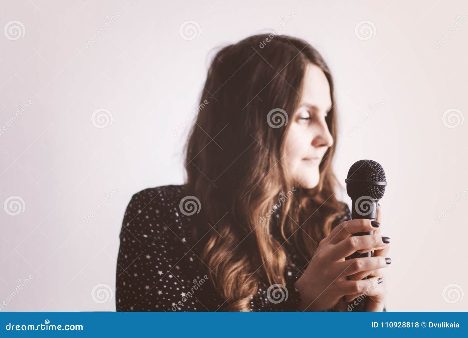 Young Woman with a Microphone in Hands Stock Photo - Image of jazz ...