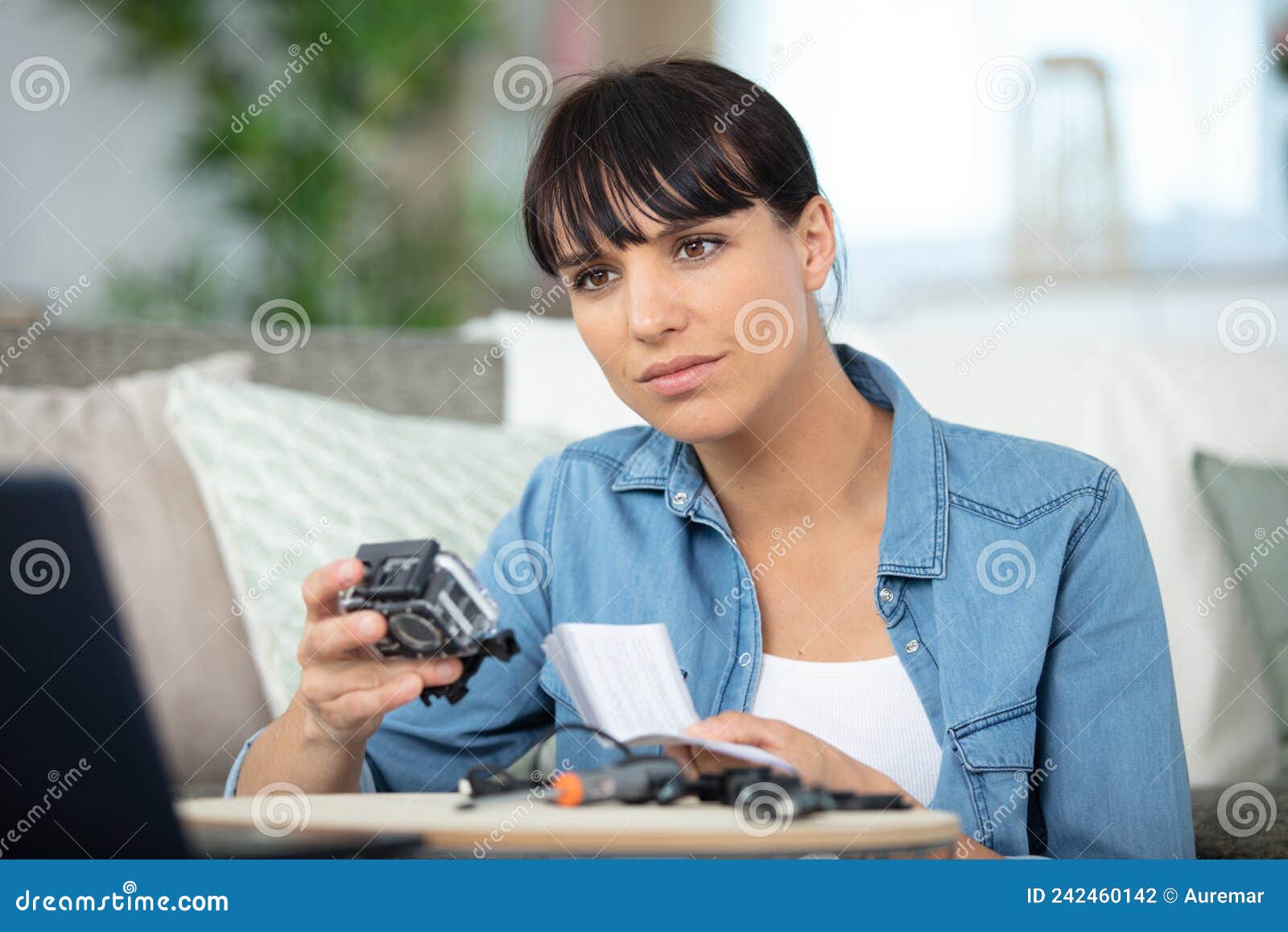 Young Woman Mounting Adventure Camera Stock Photo - Image of sunny ...