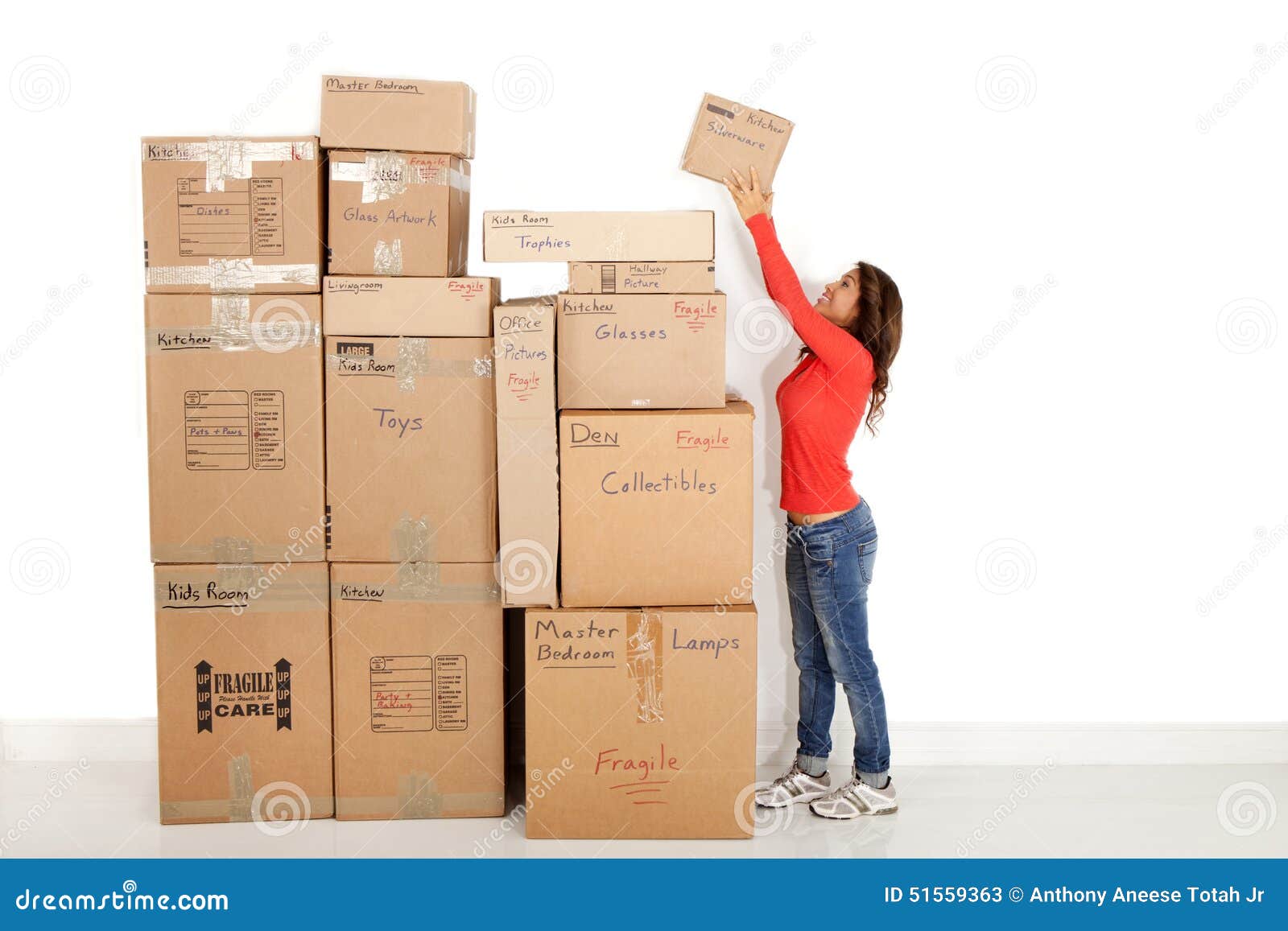 Young woman moving boxes stock image. Image of clothing - 51559363
