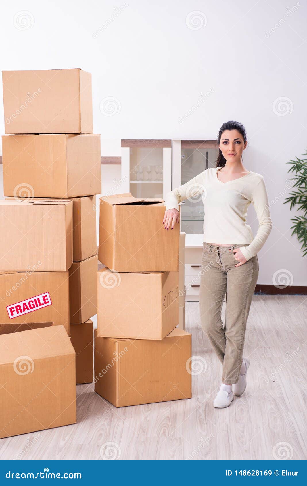 Young Woman Moving To New Flat Stock Image - Image of alone, mover ...
