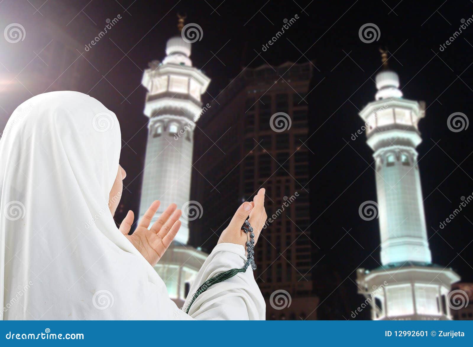A Muslim Pilgrim Praying Inside The Grand Masjid Al-Haram In Mecca ...