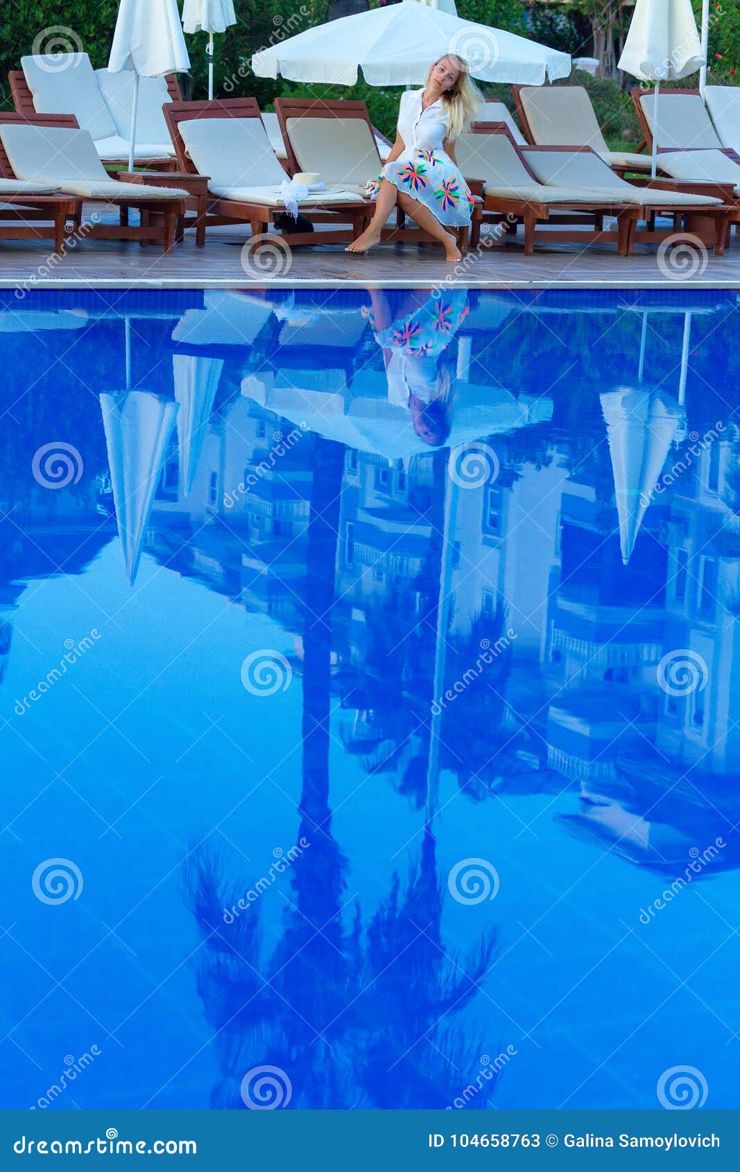 Reflection in the pool stock image. Image of tropical - 104658763