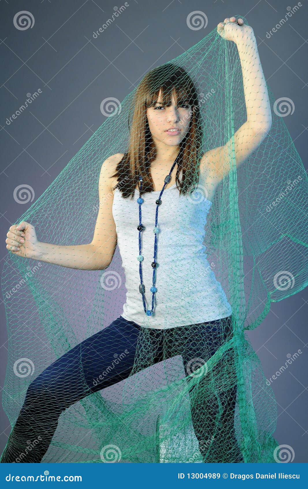 Young woman in netting stock image. Image of fashion - 13004989