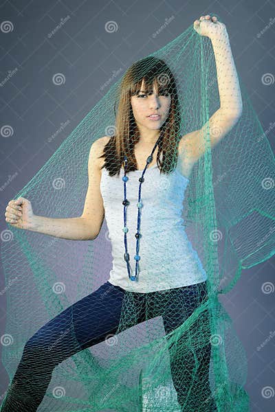 Young woman in netting stock image. Image of fashion - 13004989