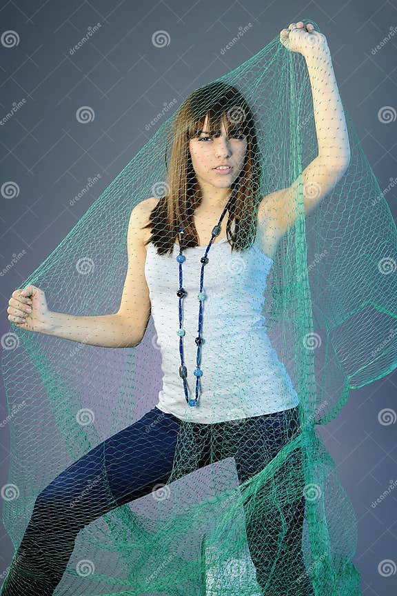 Young woman in netting stock image. Image of fashion - 13004989