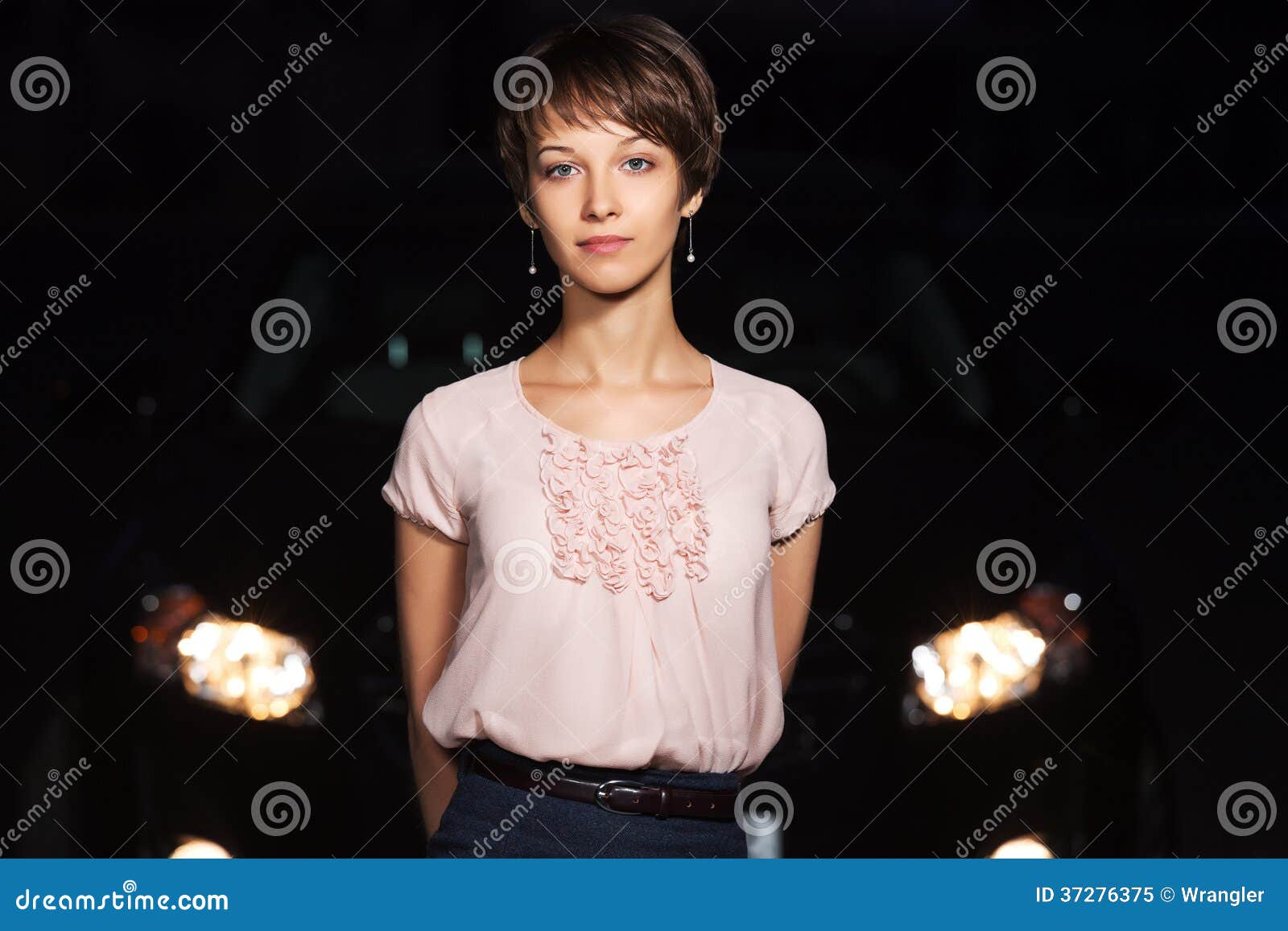 Young Woman in the Night in Front of Car Headlights Stock Image - Image ...