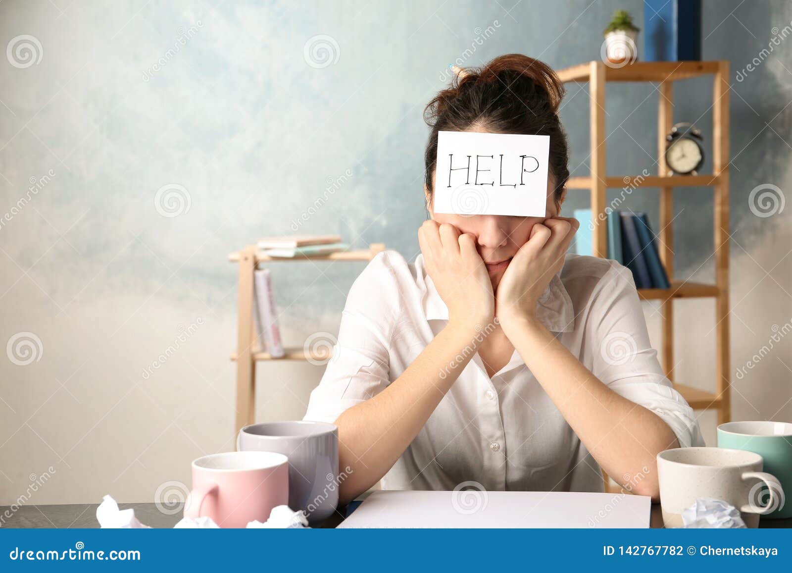 Young Woman with Note HELP on Forehead at Workplace Stock Photo - Image ...