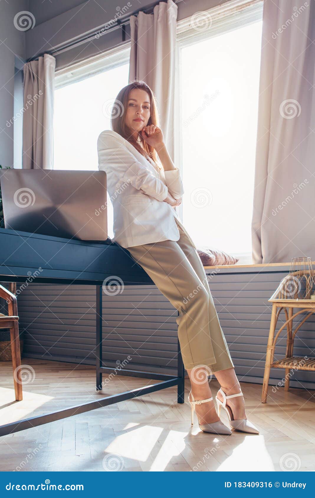 Young Woman in Office Stands at Workplace. Stock Photo - Image of ...