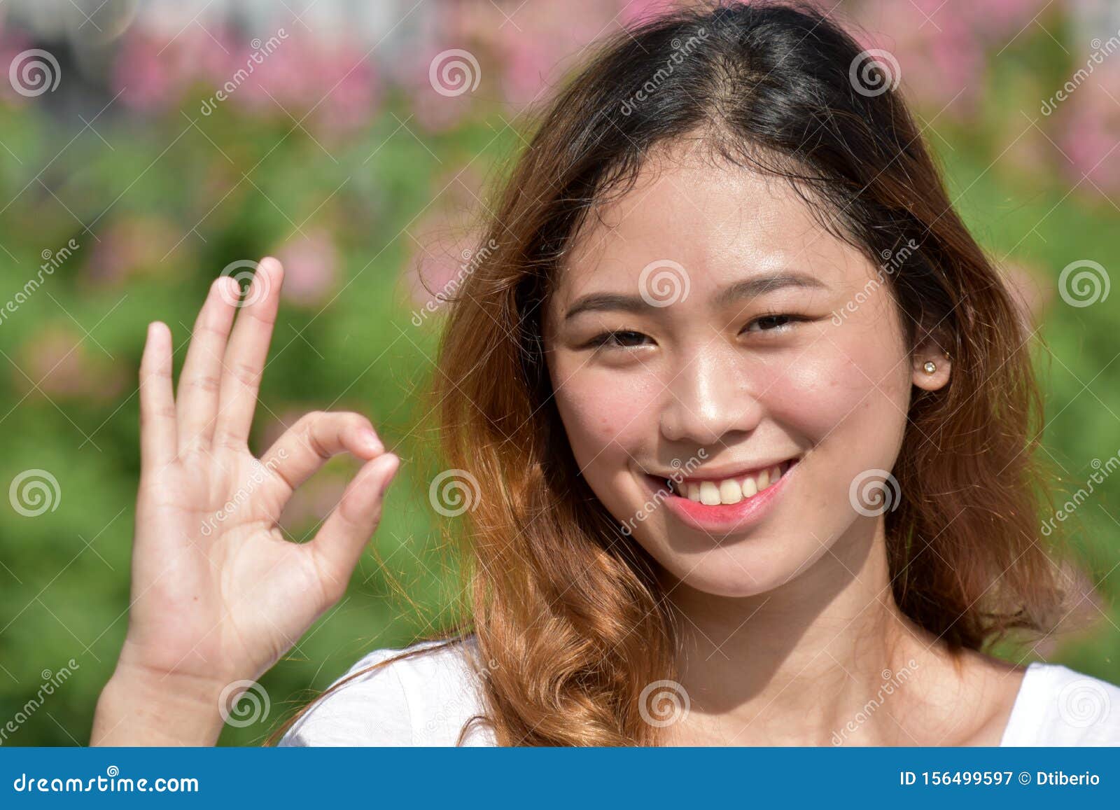 Young Woman and Okay Sign stock image. Image of youth - 156499597