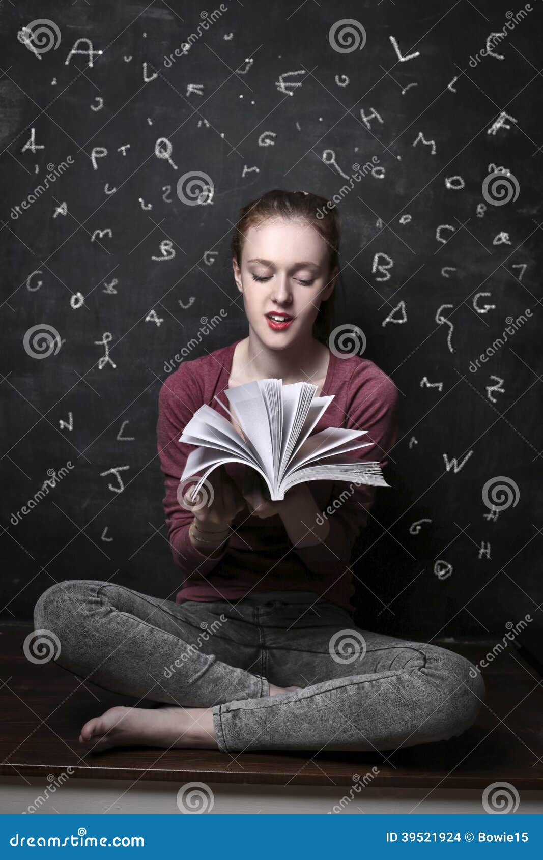 Young woman opening a book stock photo. Image of school - 39521924