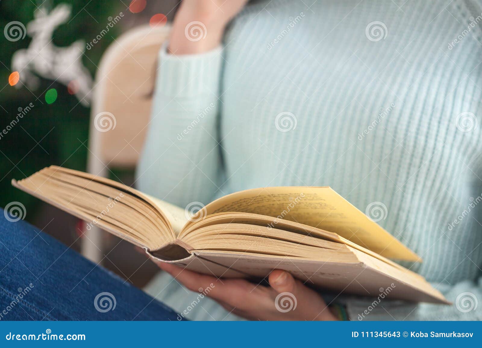 Young Woman Opening and Reading a Book, Close Up Stock Image - Image of ...