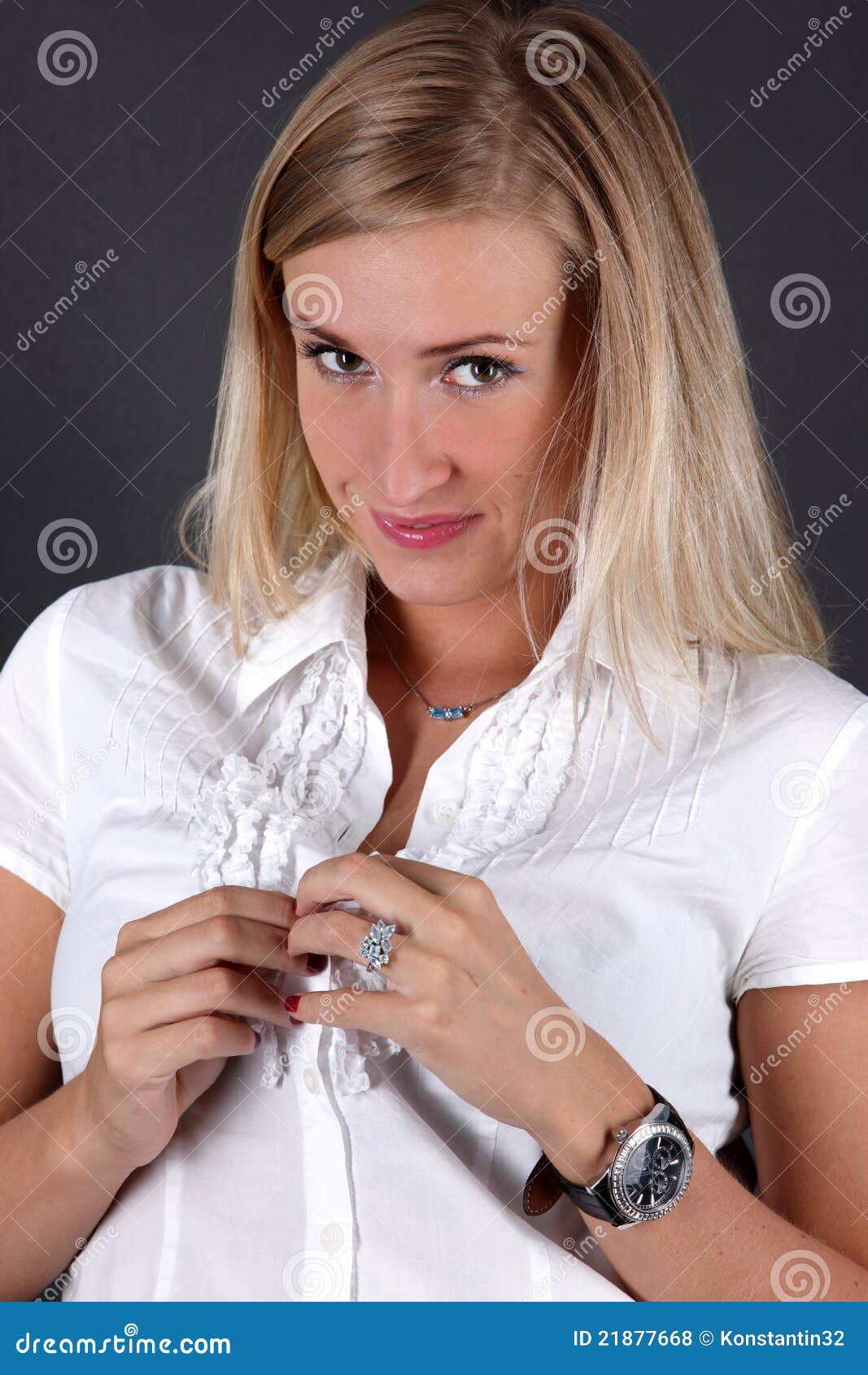Young Woman Opening Shirt Royalty Free Stock Photos - Image: 21877668