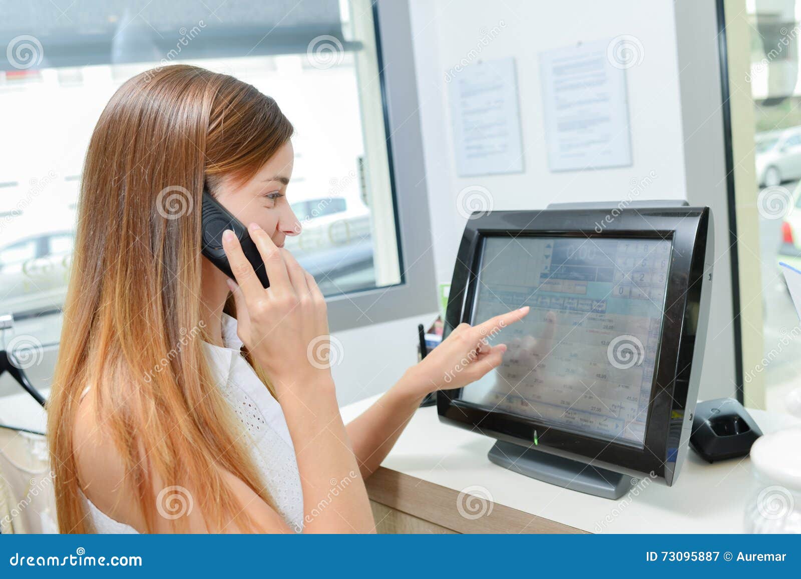 Young woman operating till stock image. Image of keypad - 73095887