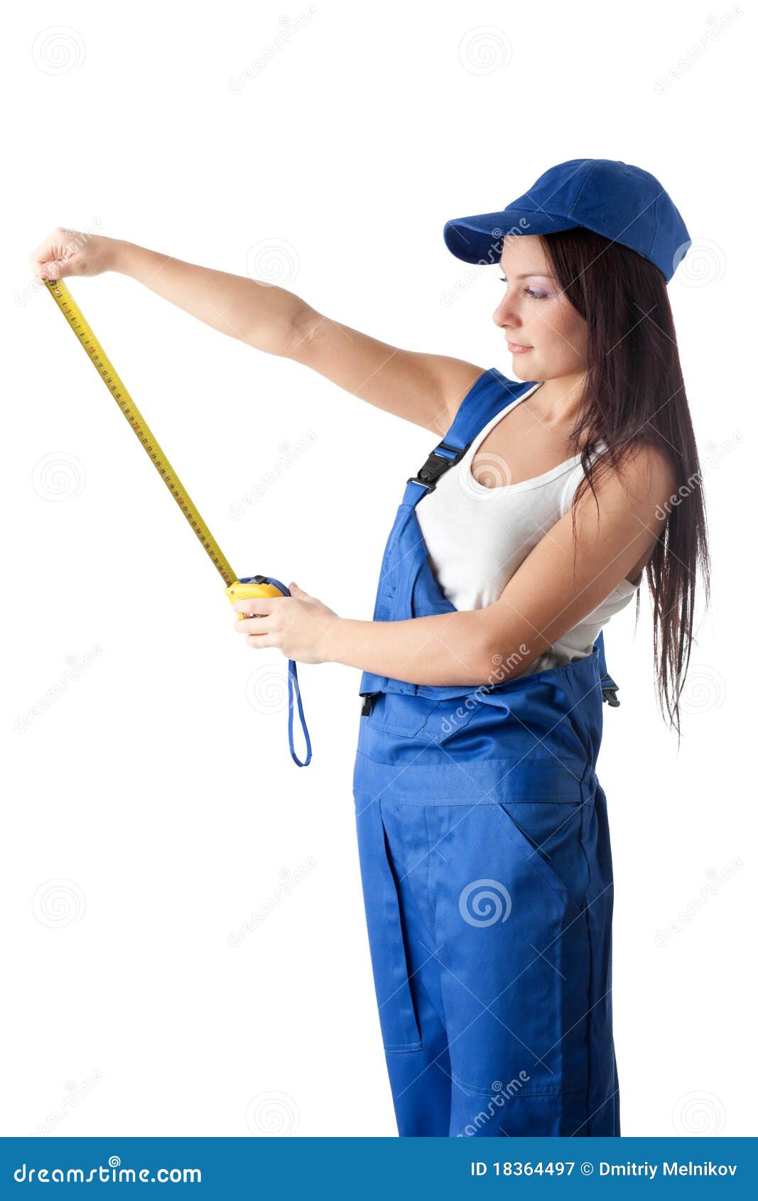 Young Woman in Overalls with a Measuring Tape Stock Image - Image of ...