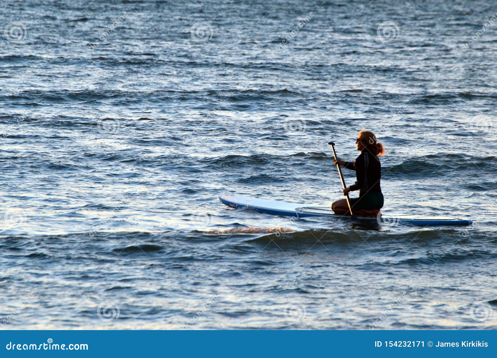 A Young Woman Paddles into the Open Sea Editorial Photo - Image of ...
