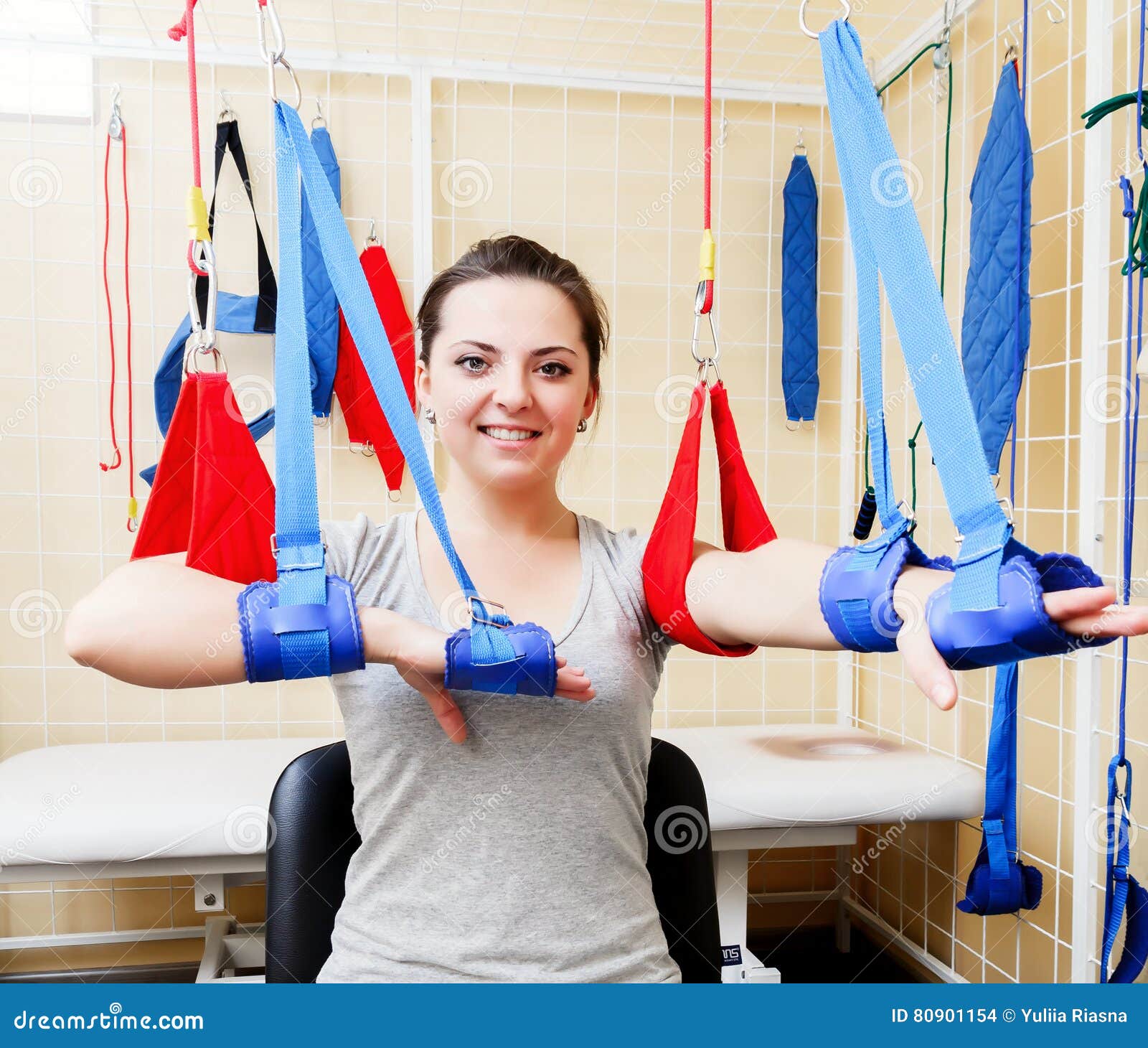 Young Woman Patient Doing Physical Exercises in a Rehabilitation Study ...