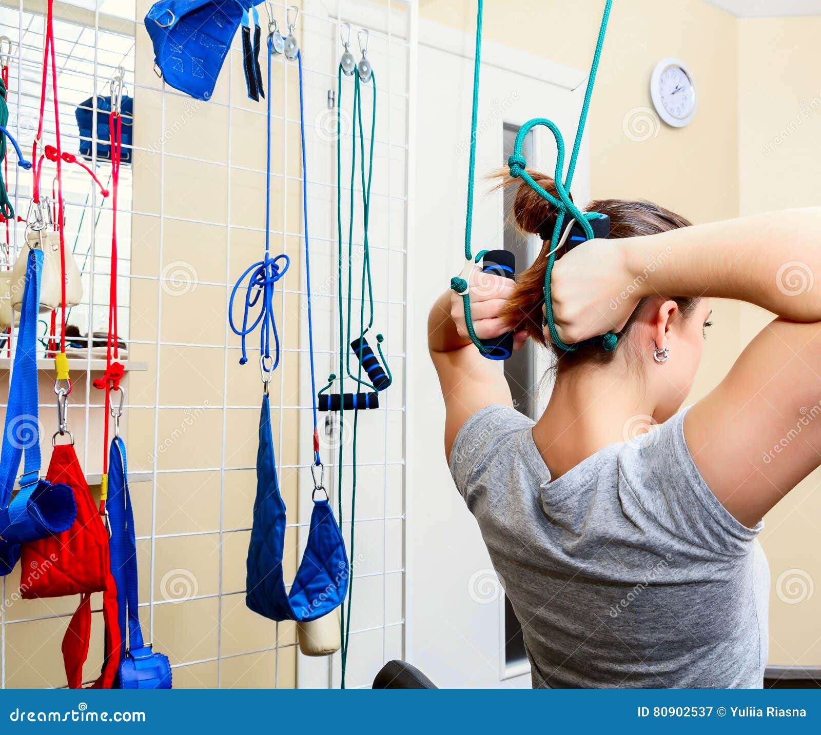 Young Woman Patient Doing Physical Exercises in a Rehabilitation Study ...