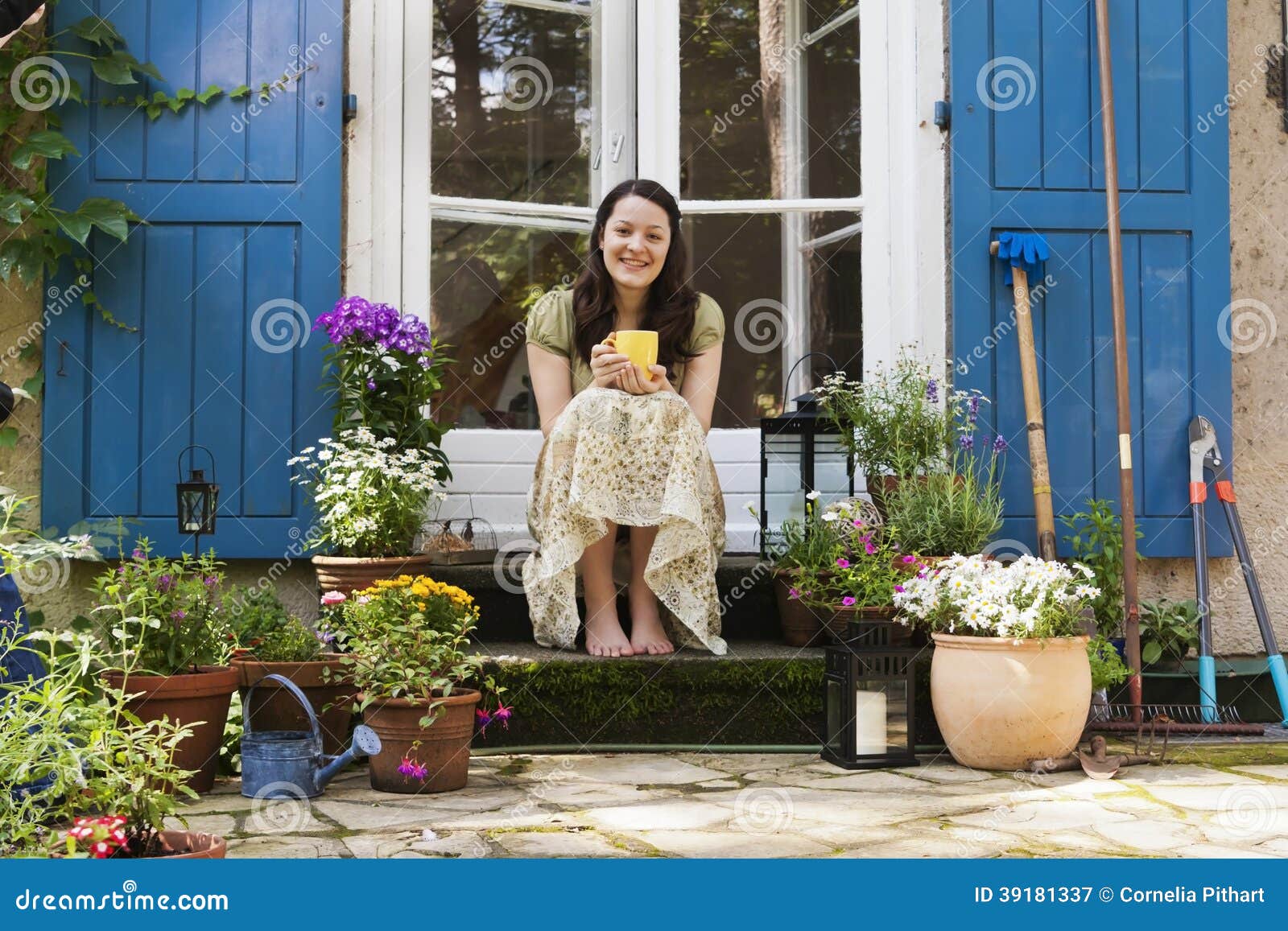 Young woman on a patio stock image. Image of stairs, break - 39181337