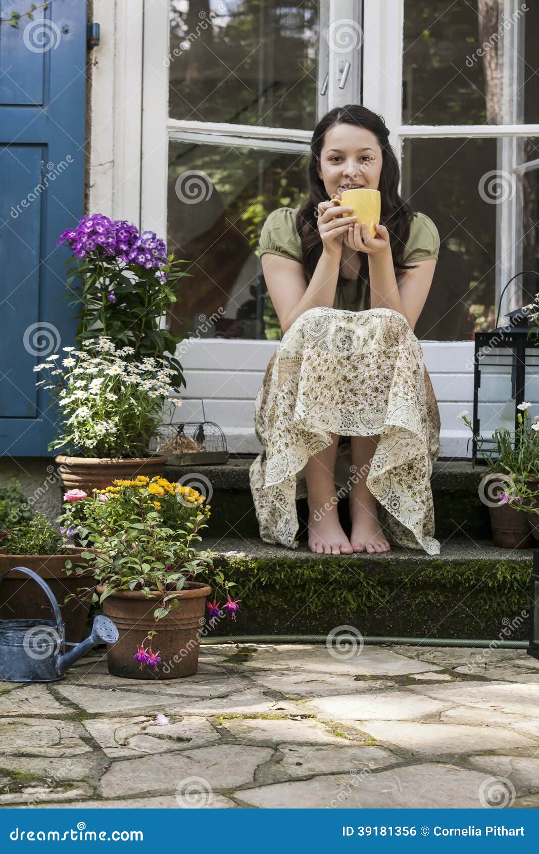 Young woman on a patio stock photo. Image of relaxation - 39181356