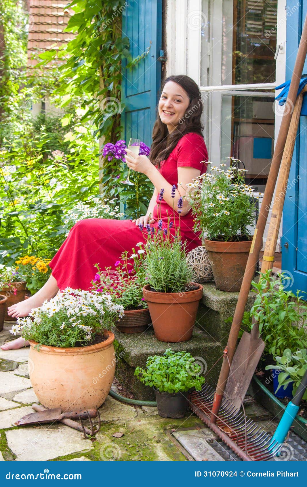 Young woman on a patio stock photo. Image of dress, stairs - 31070924
