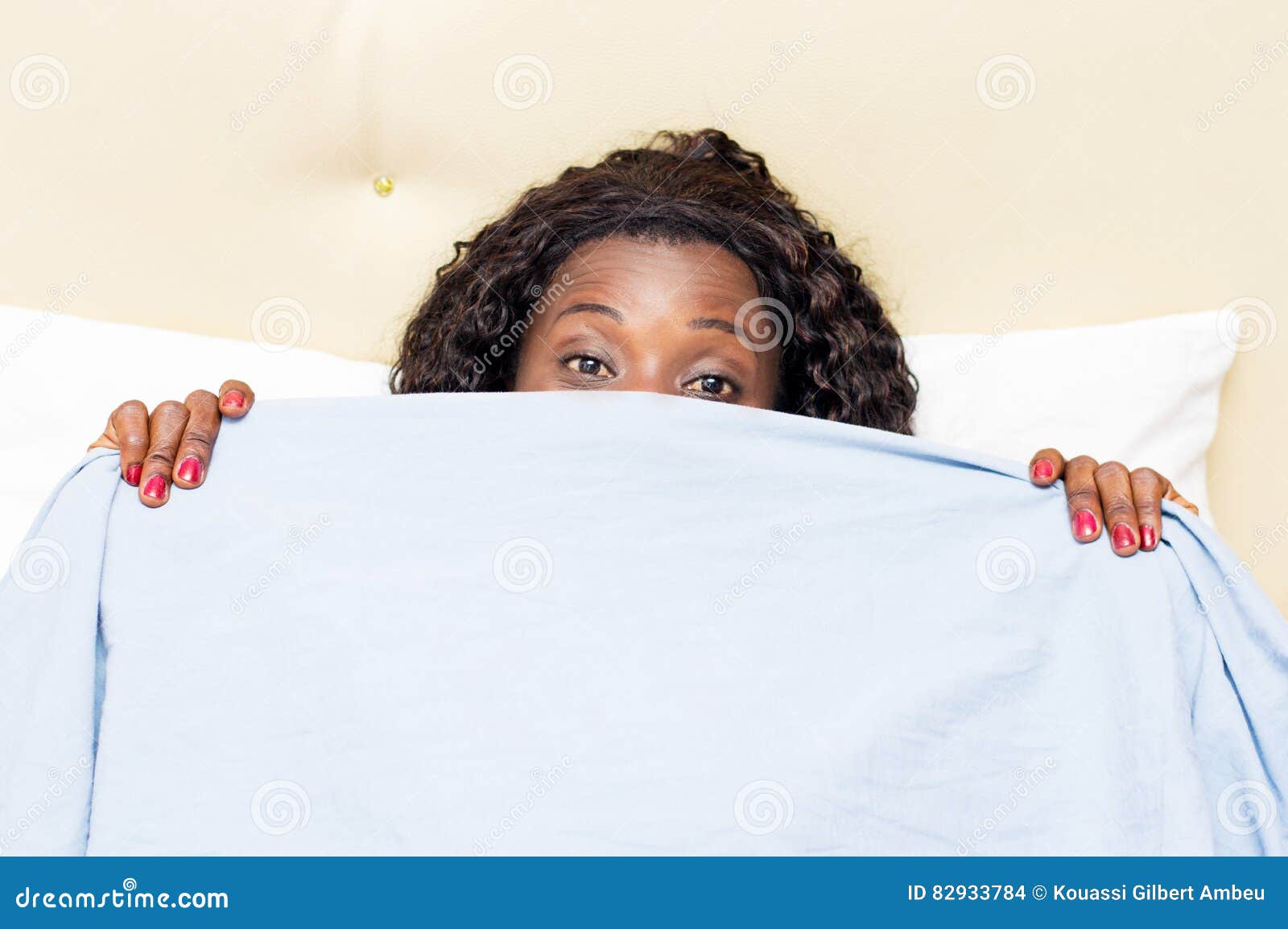 Young woman peeking out. stock photo. Image of woman - 82933784