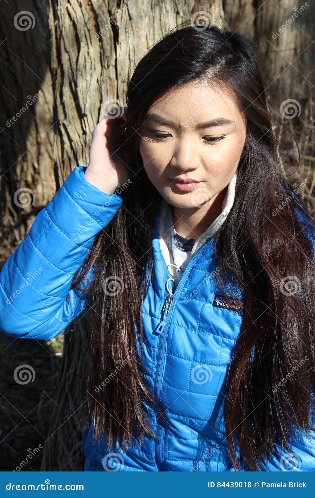 Young Woman in Pensive Mood in a Forest Setting Stock Photo - Image of ...