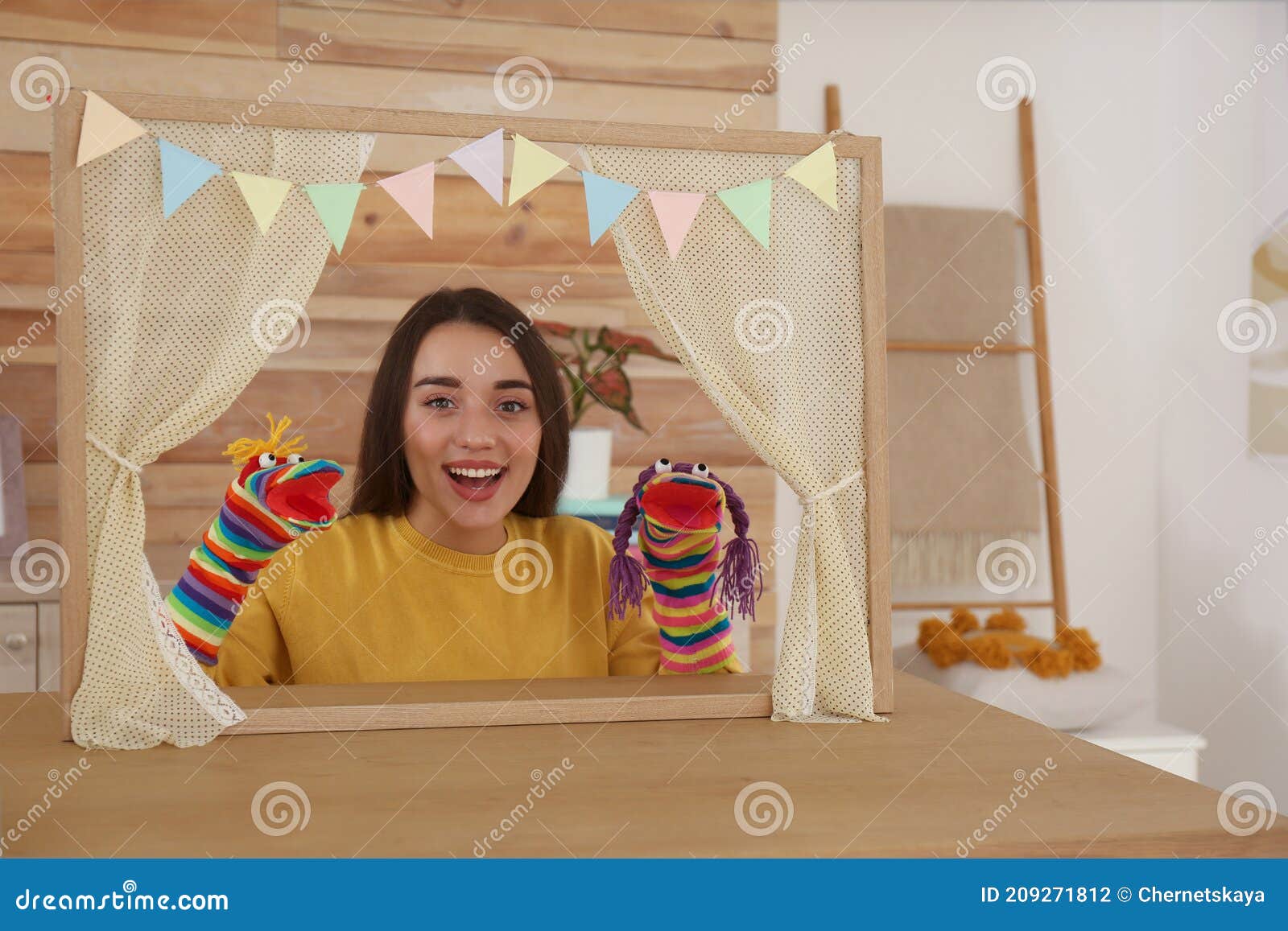 Young Woman Performing Puppet Show at Home Stock Photo - Image of adult ...