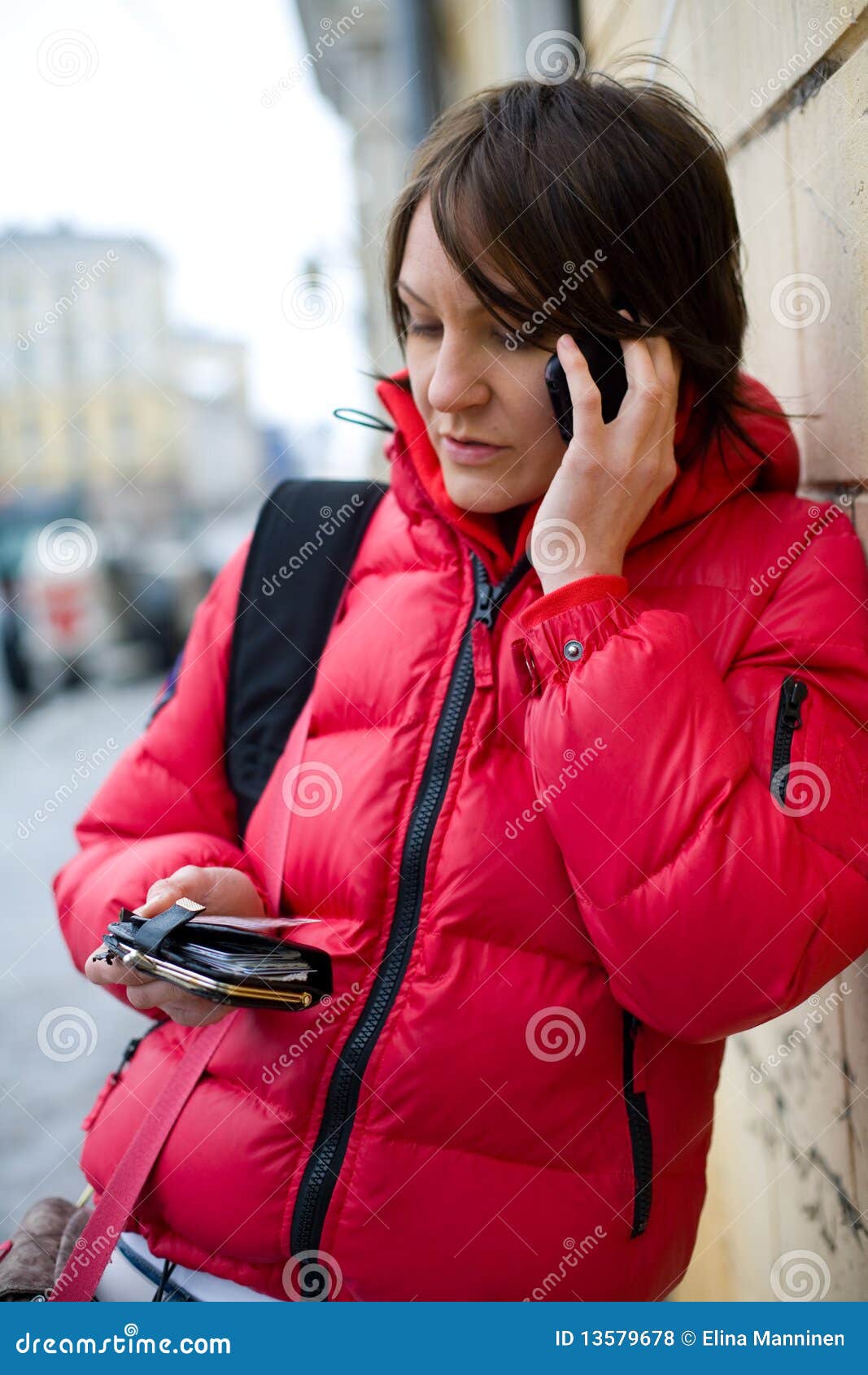 Young woman on the phone stock photo. Image of purse - 13579678