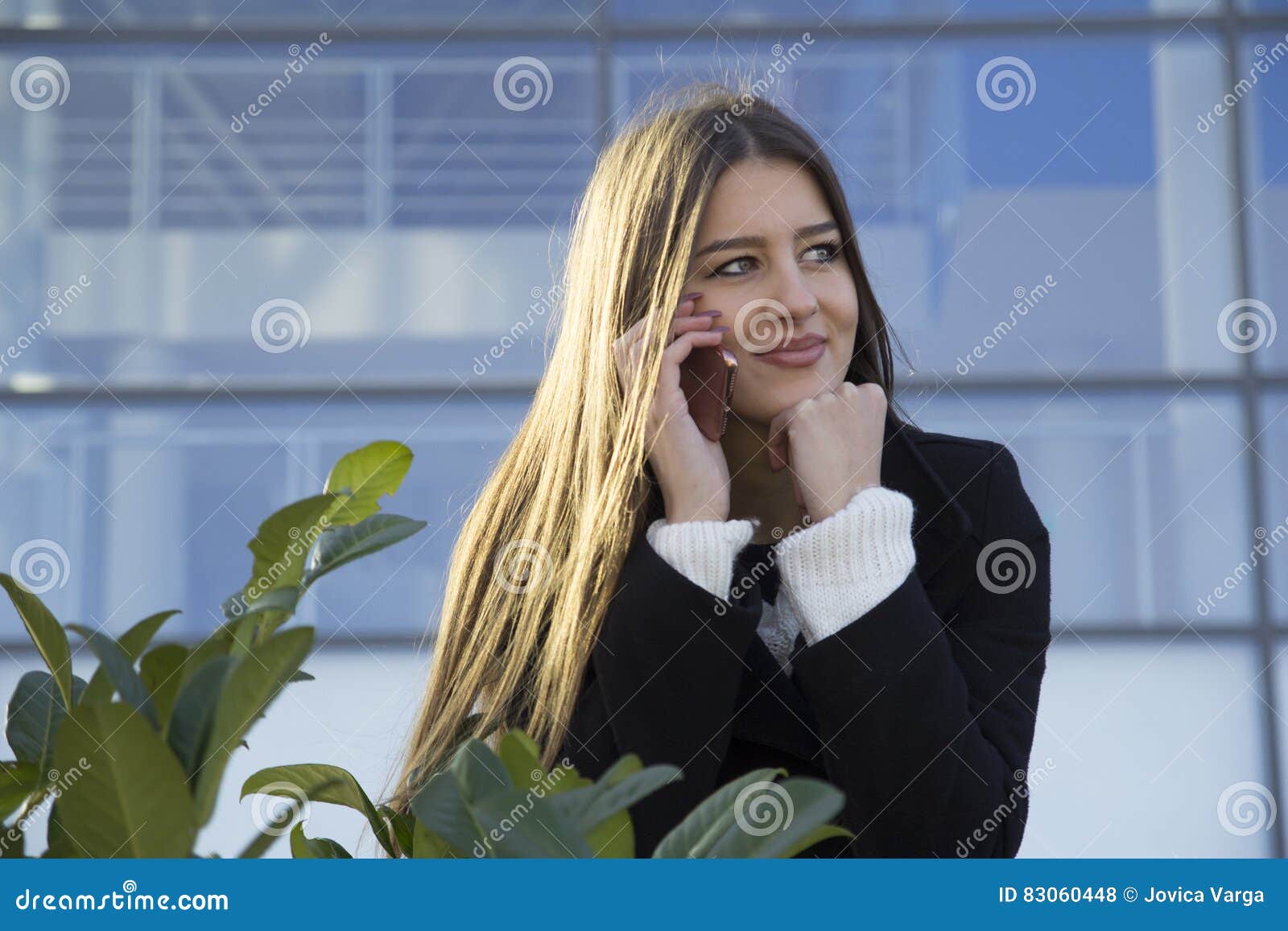 Young woman phoning stock photo. Image of business, people - 83060448