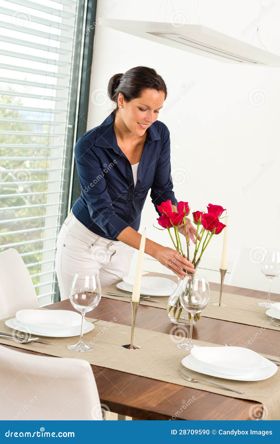 Young Woman Placing Flowers Dinner Table Stock Photo - Image of vase ...