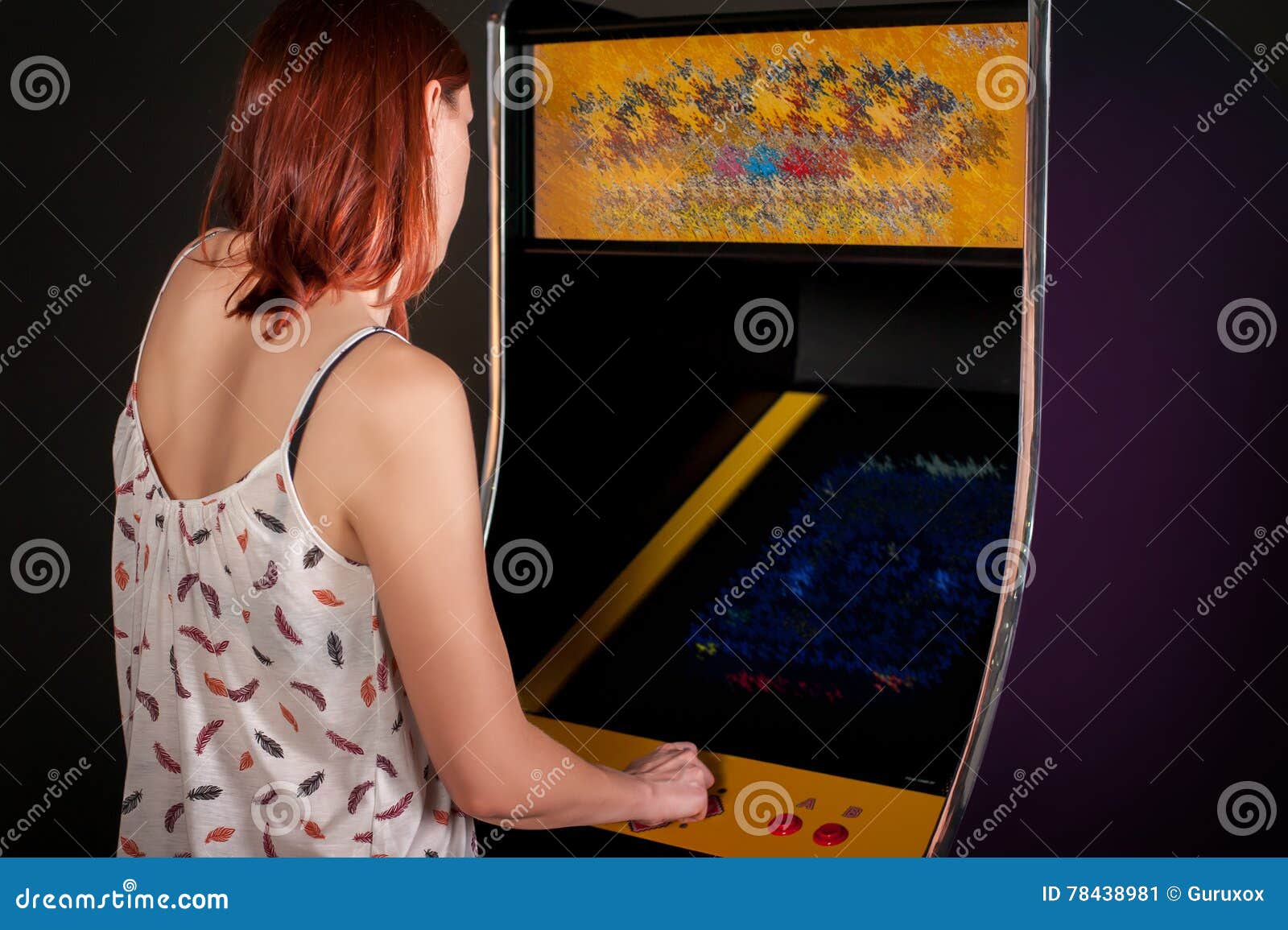 Young woman playing arcade stock image. Image of arcade - 78438981