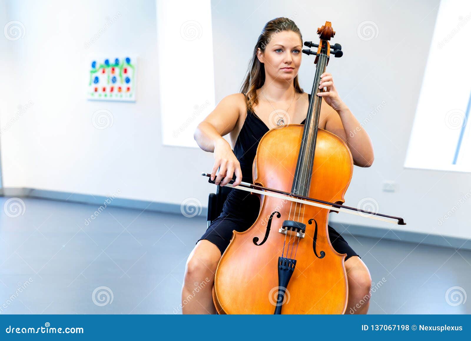 Woman playing cello stock photo. Image of beautiful - 137067198