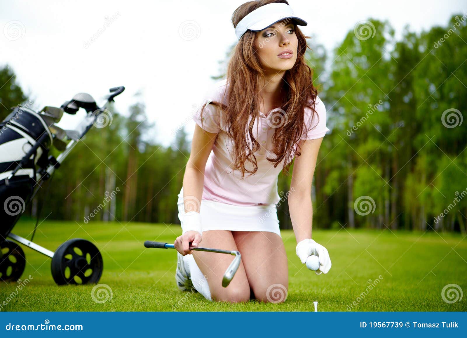 Young woman playing golf stock image. Image of relax - 19567739
