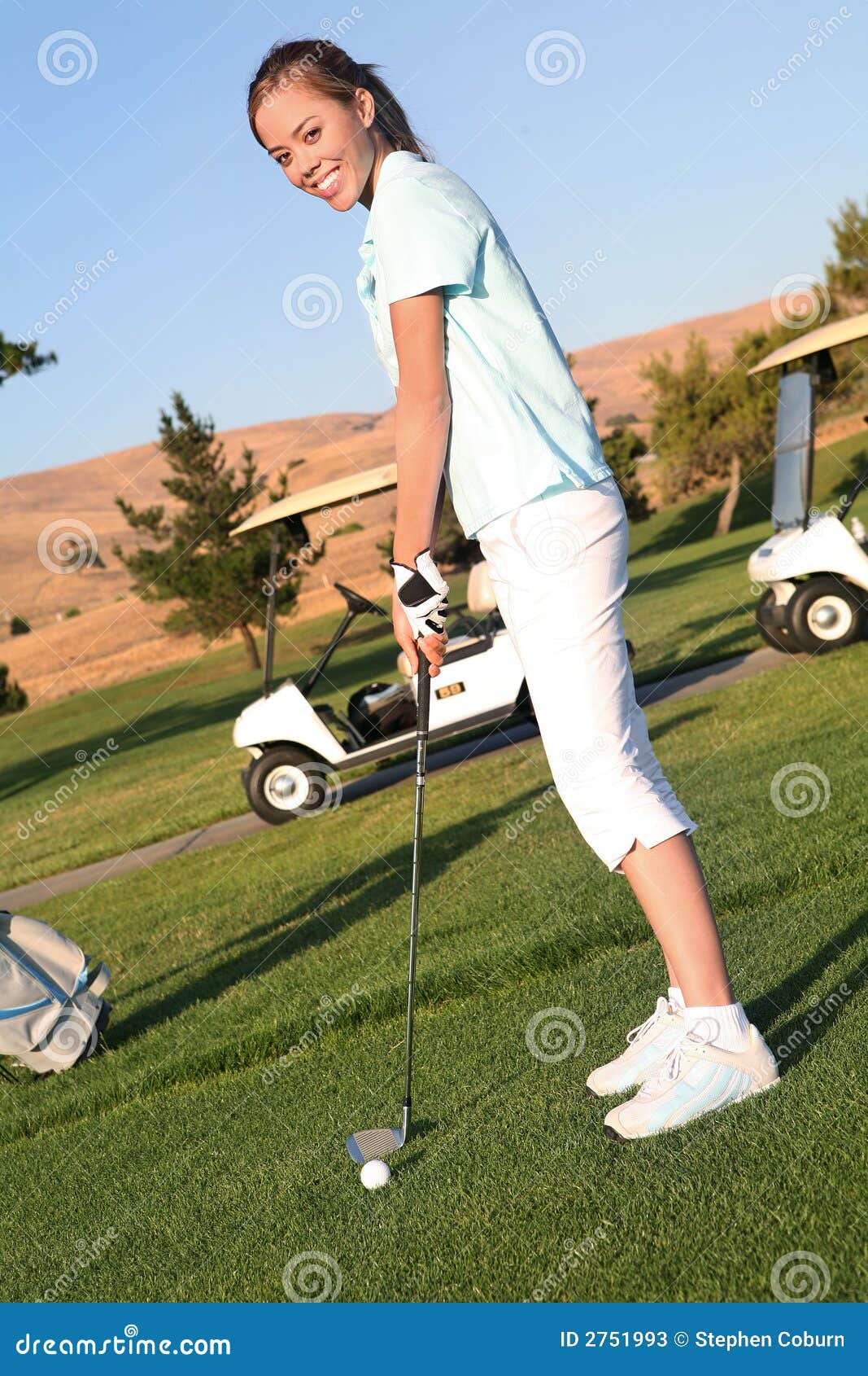 Young woman playing golf stock image. Image of cheerful - 2751993