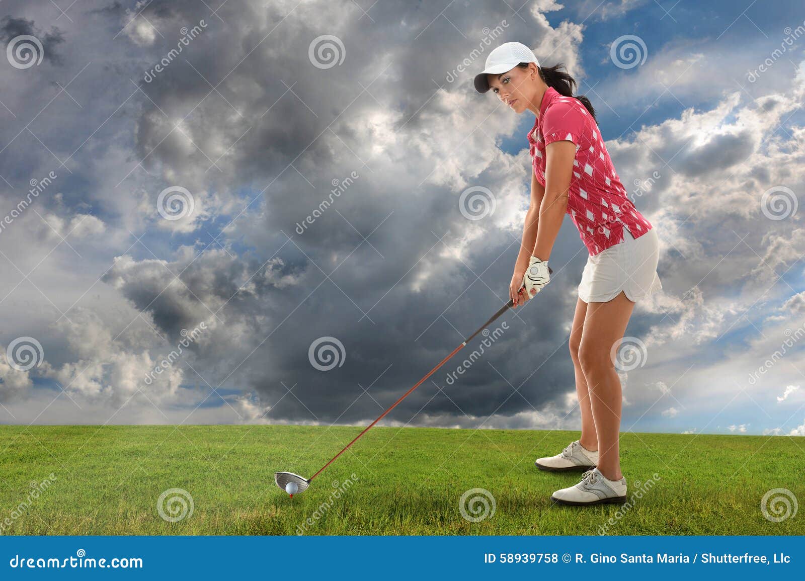 Young Woman Playing Golf stock photo. Image of golfer - 58939758