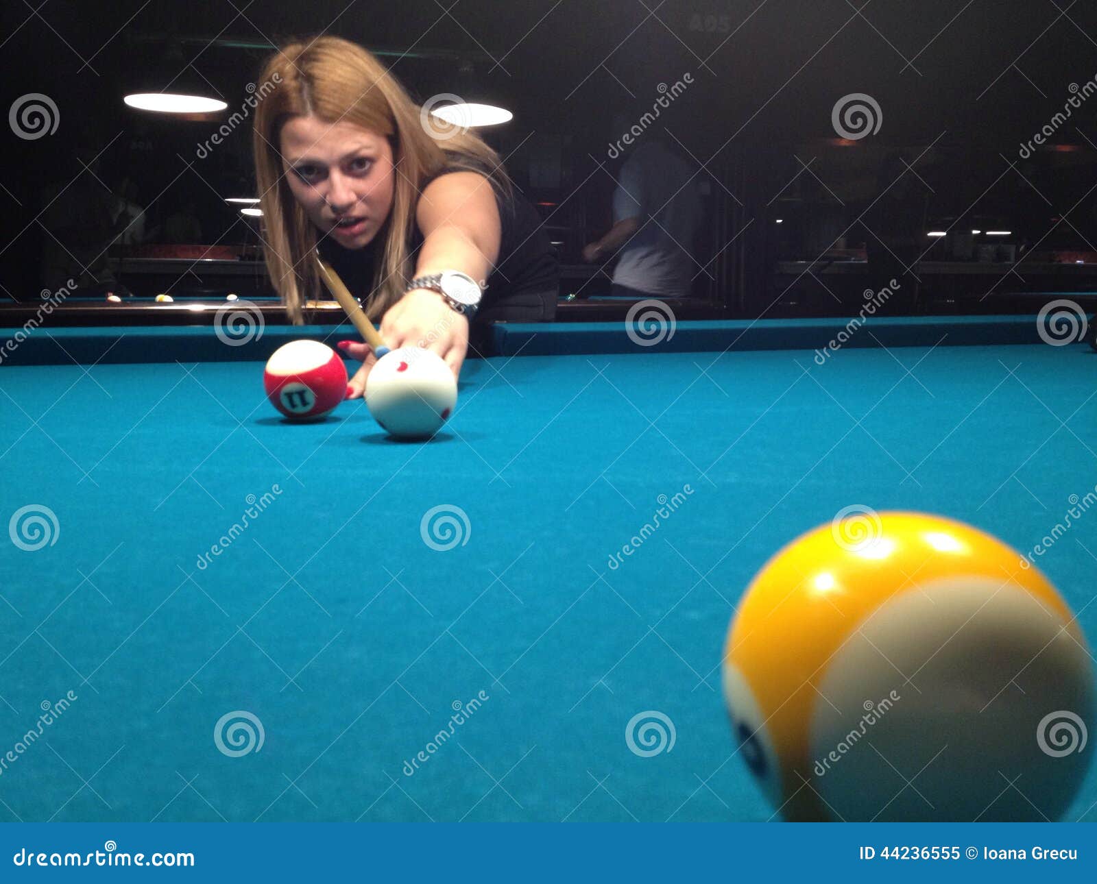 Young woman playing pool editorial image. Image of blonde - 44236555