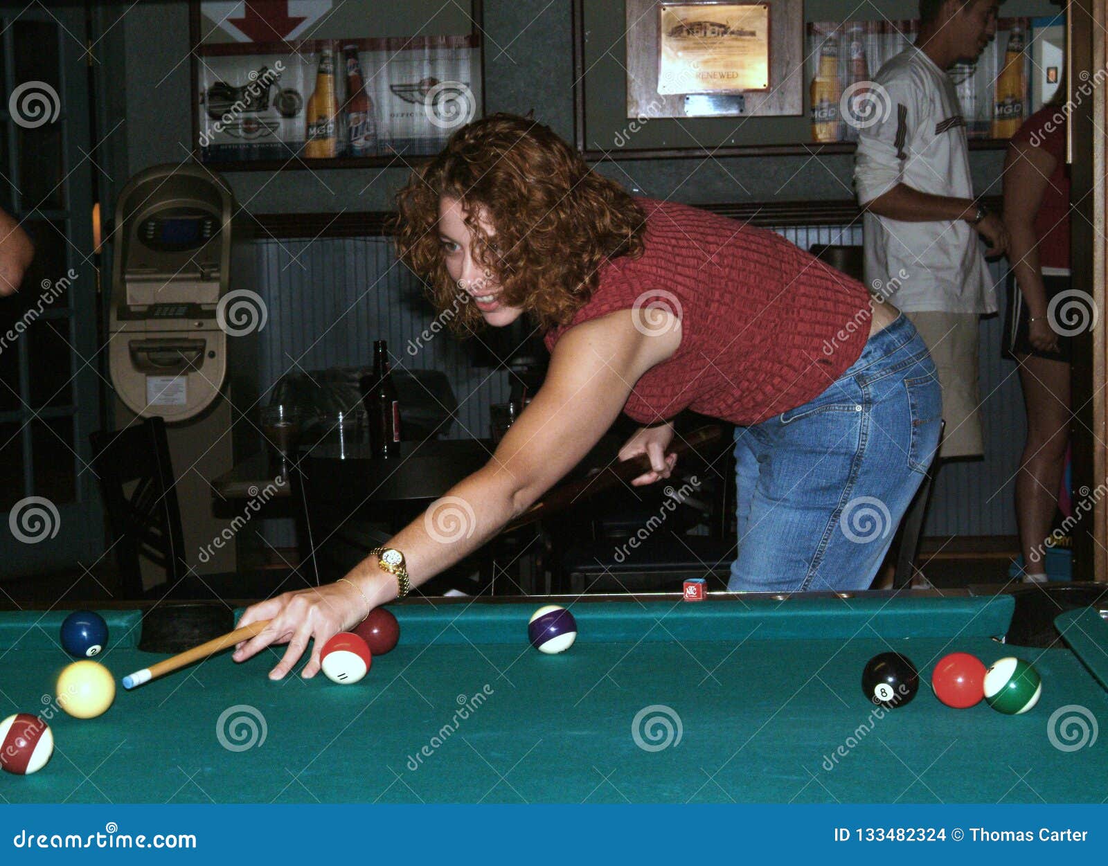 Young woman playing pool editorial stock image. Image of hall - 133482324