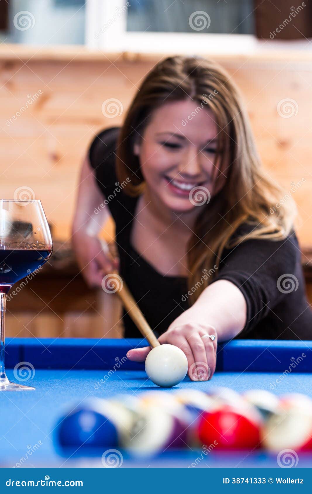Young woman playing pool stock image. Image of concentrated - 38741333