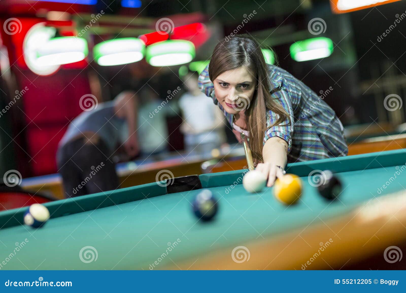 Young woman playing pool stock image. Image of leisure - 55212205